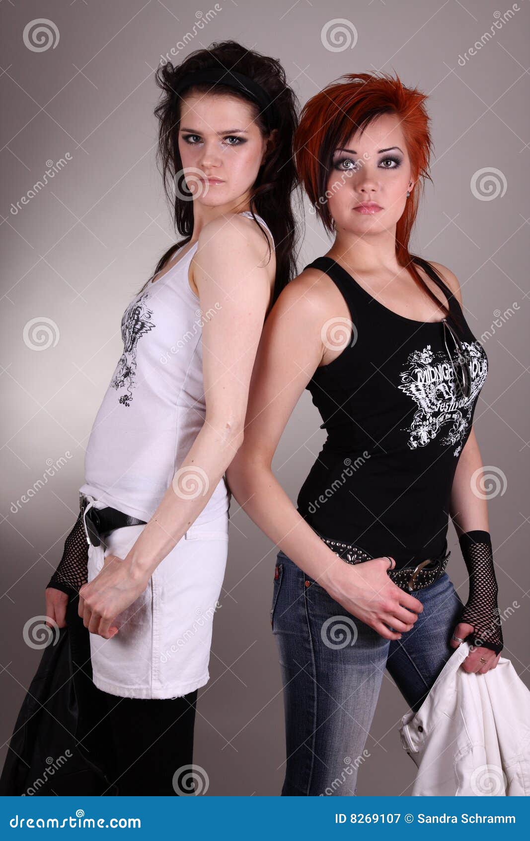 Two Models in Colorful Setting in the Studio Stock Image - Image of ...
