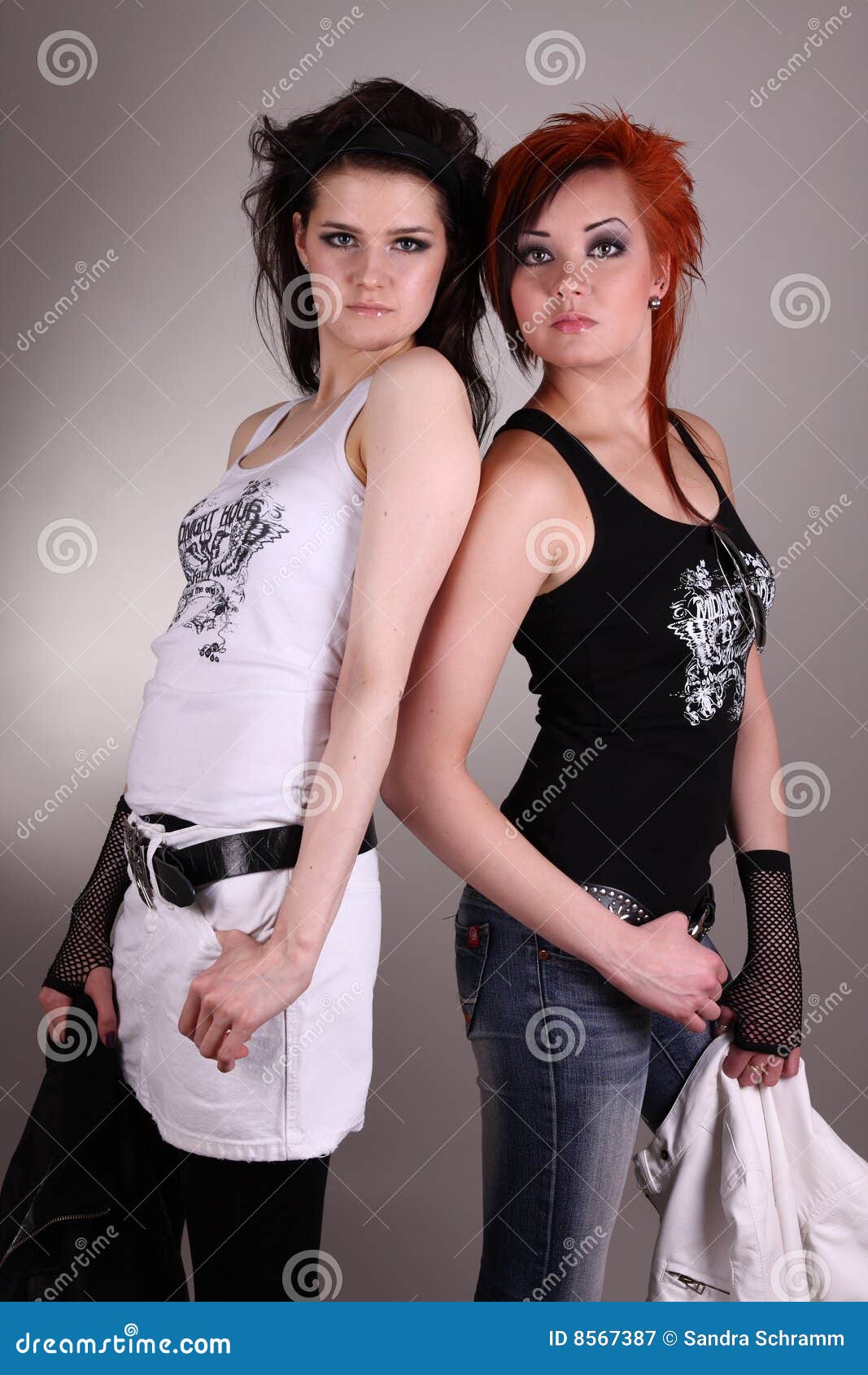 Two Models in Colorful Setting in the Studio Stock Image - Image of ...