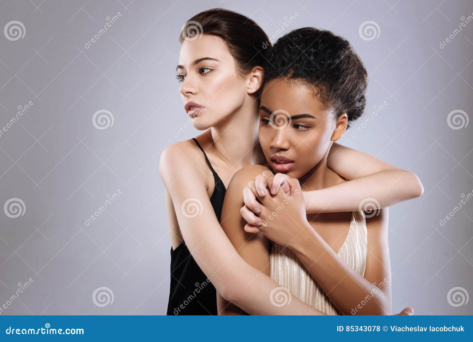 Two Models of Different Background Posing Together Stock Photo - Image ...