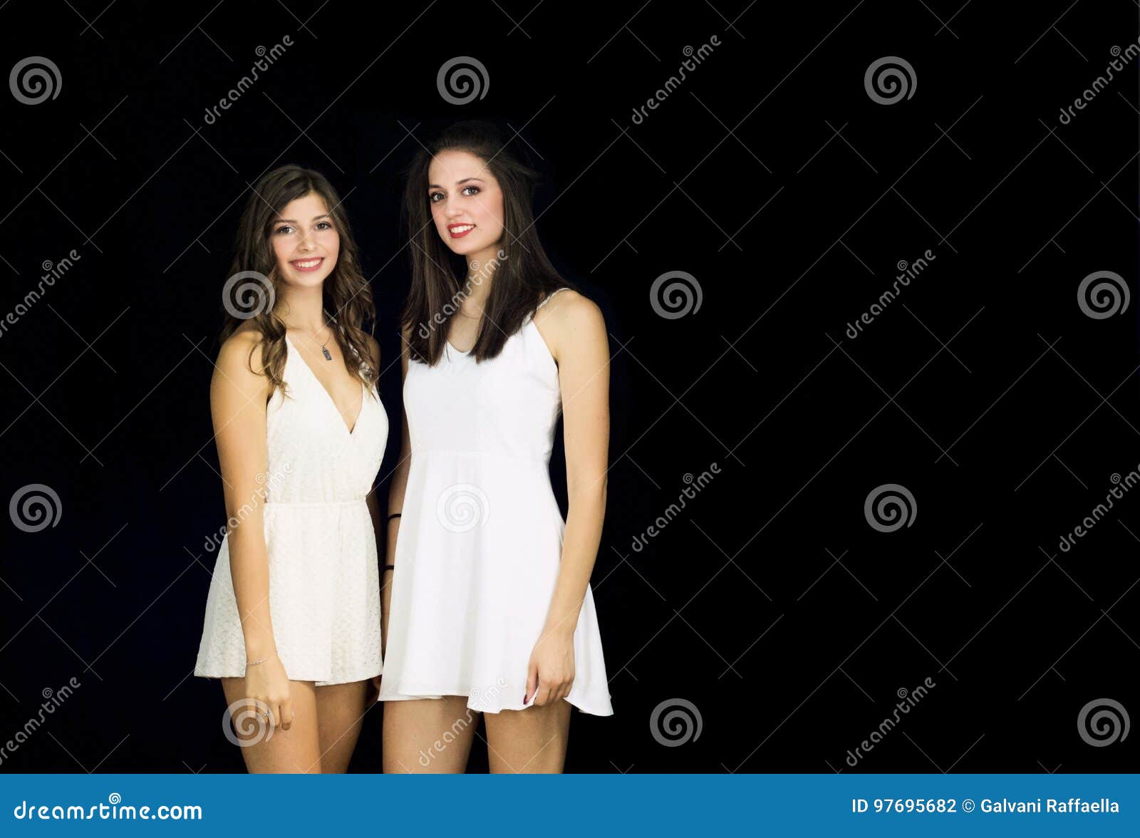 Two Models in White Dress Posing Smiling. Stock Photo - Image of white ...