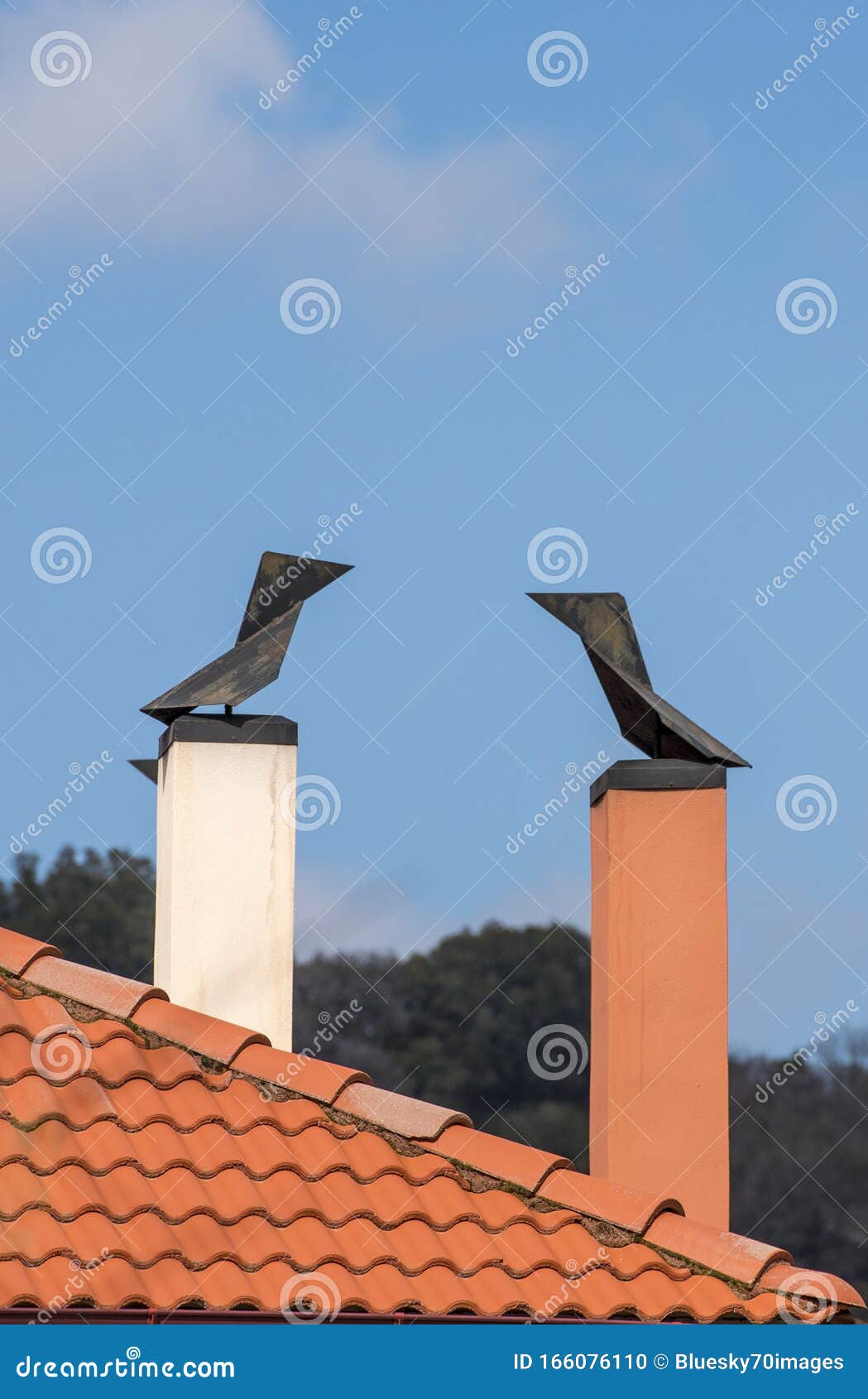 Two Modern Brick Chimneys with Wind Cone on the Roofs Stock Photo ...