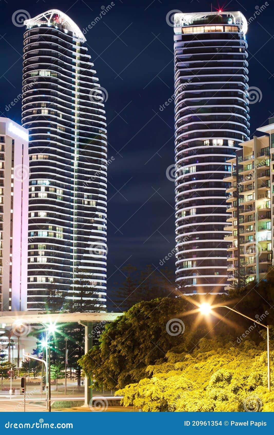 Two modern towers at night stock photo. Image of monorail - 20961354