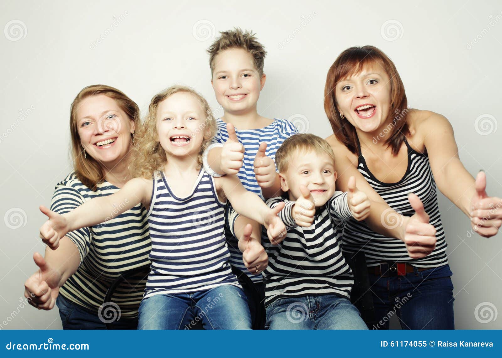 Two moms and three kids stock image. Image of happy, smile - 61174055