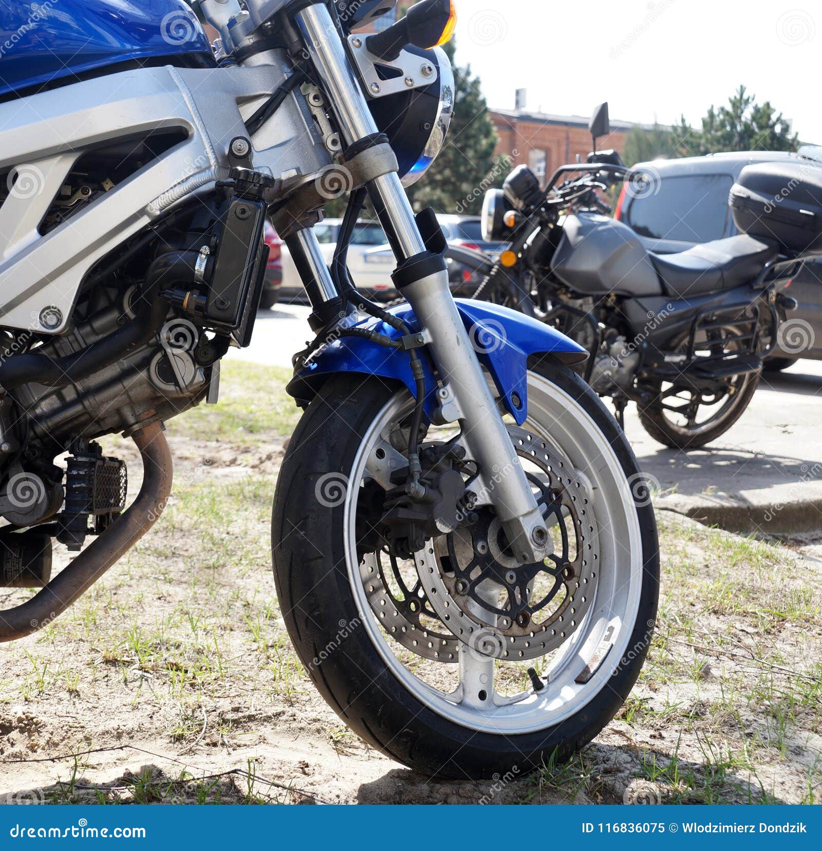 Two Motorcycles, Blue and Gray. Close-up on Wheel and Engine. Stock ...