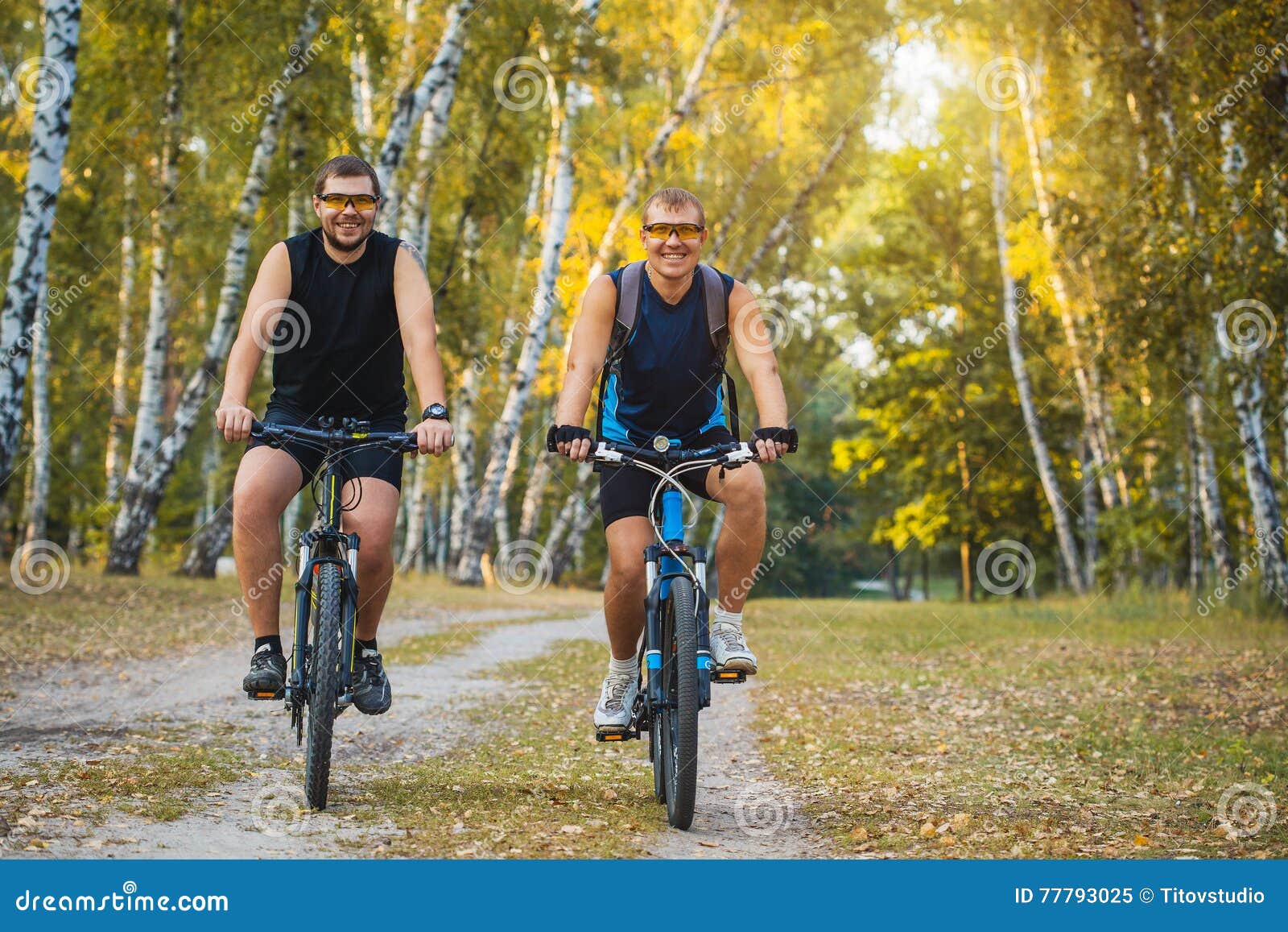 Two Mountain Bikers Riding Bike in the Forest Stock Image - Image of ...