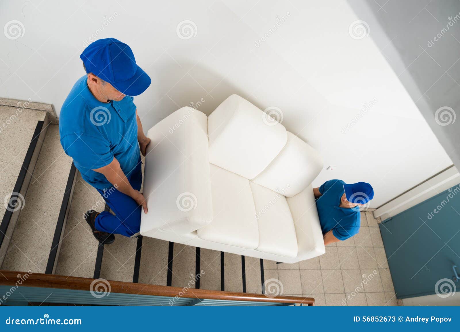 Two Movers Carrying Sofa on Staircase Stock Image - Image of mover ...
