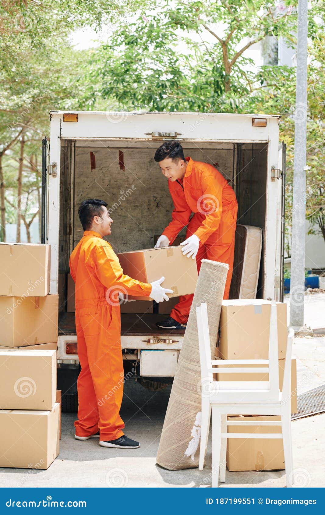 Two Moving Men at Work stock image. Image of modern - 187199551