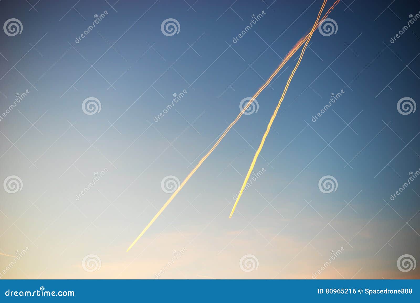 Two Moving Ufo`s with Tails in the Sky Background Stock Photo - Image ...