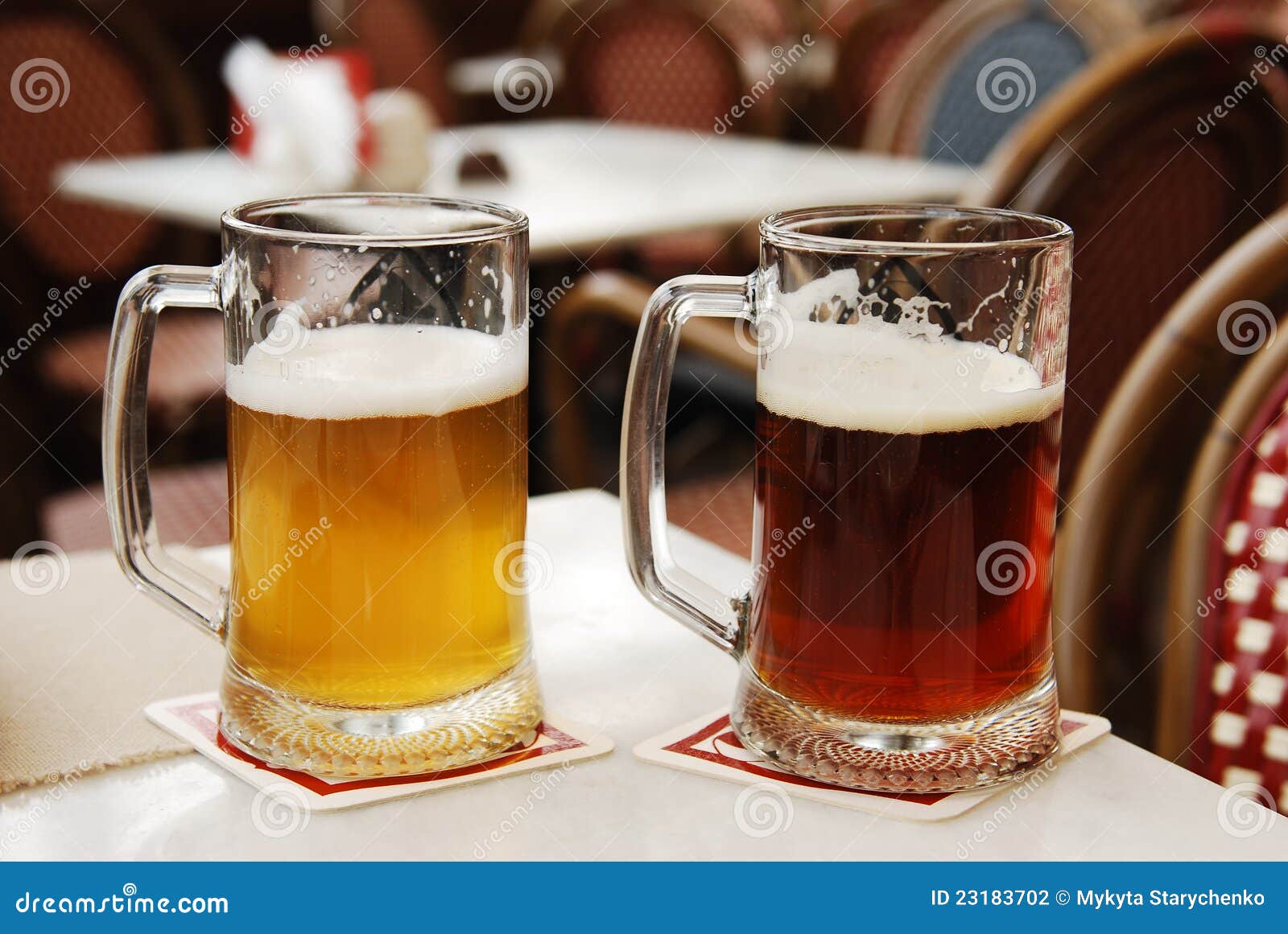 Two mugs of beer stock photo. Image of frosty, golden - 23183702