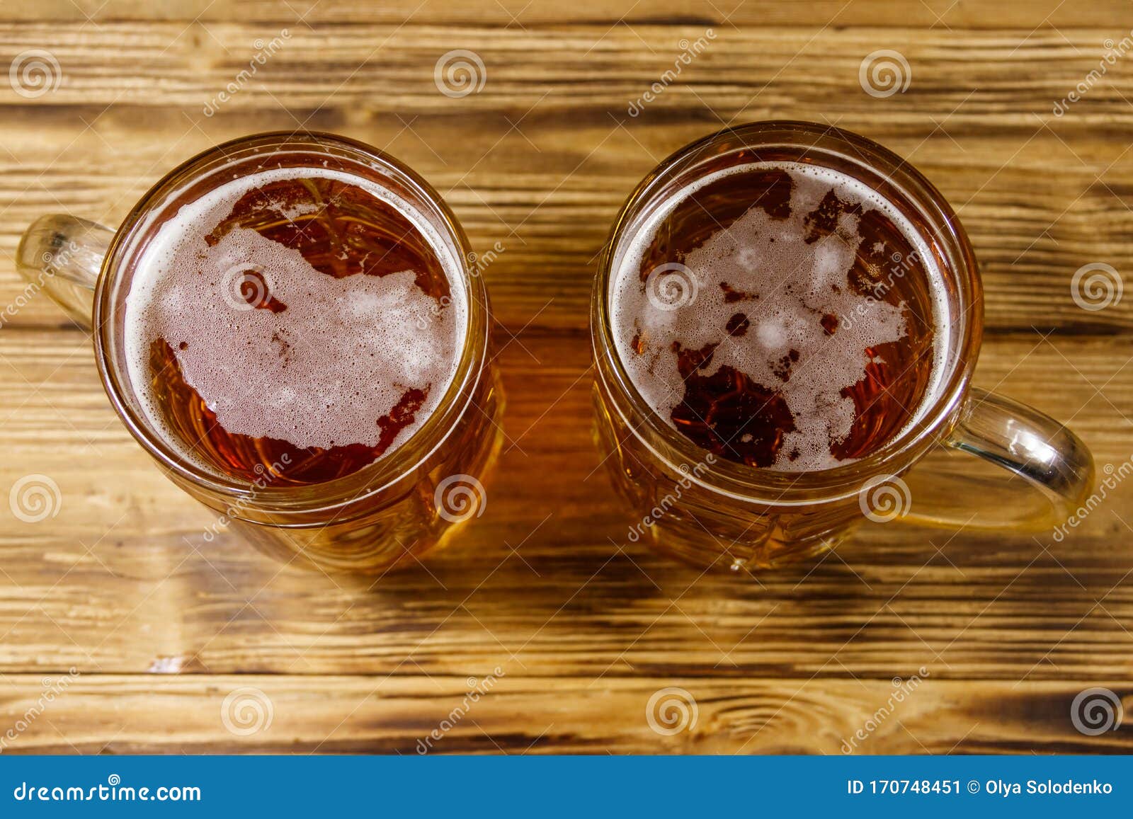 Two Mugs of Beer on Wooden Table. Top View Stock Image - Image of beer ...