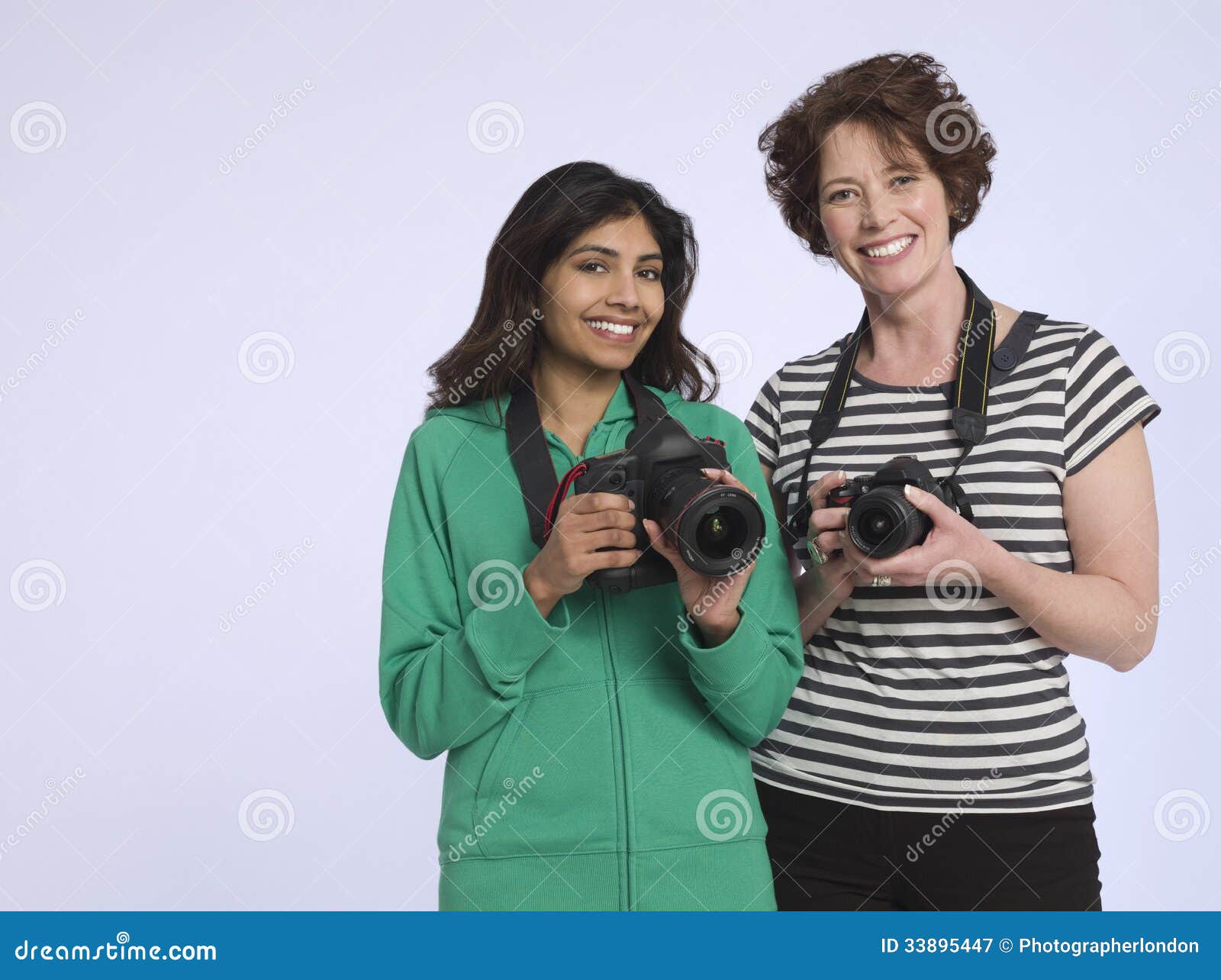 Two Multiethnic Women with Cameras Stock Image - Image of happiness ...
