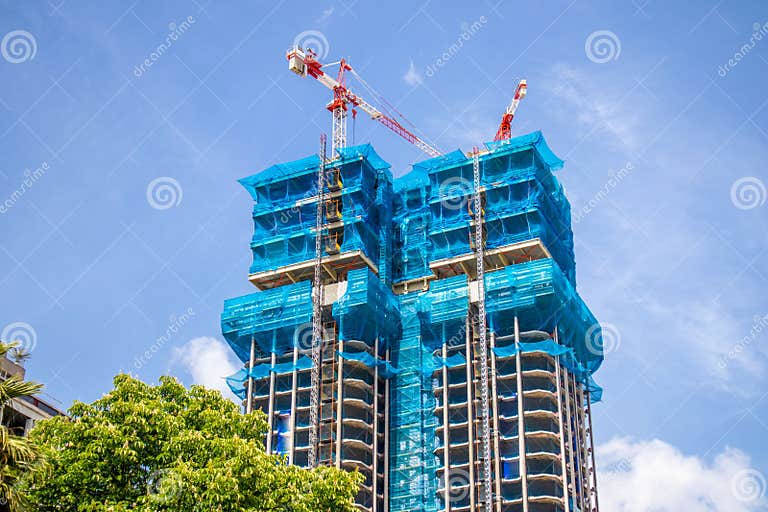Two Multistory Buildings, Which Facade is Covered with Protective ...