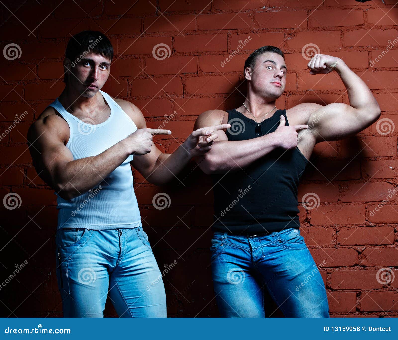 Two muscular guys stock photo. Image of model, competitive - 13159958