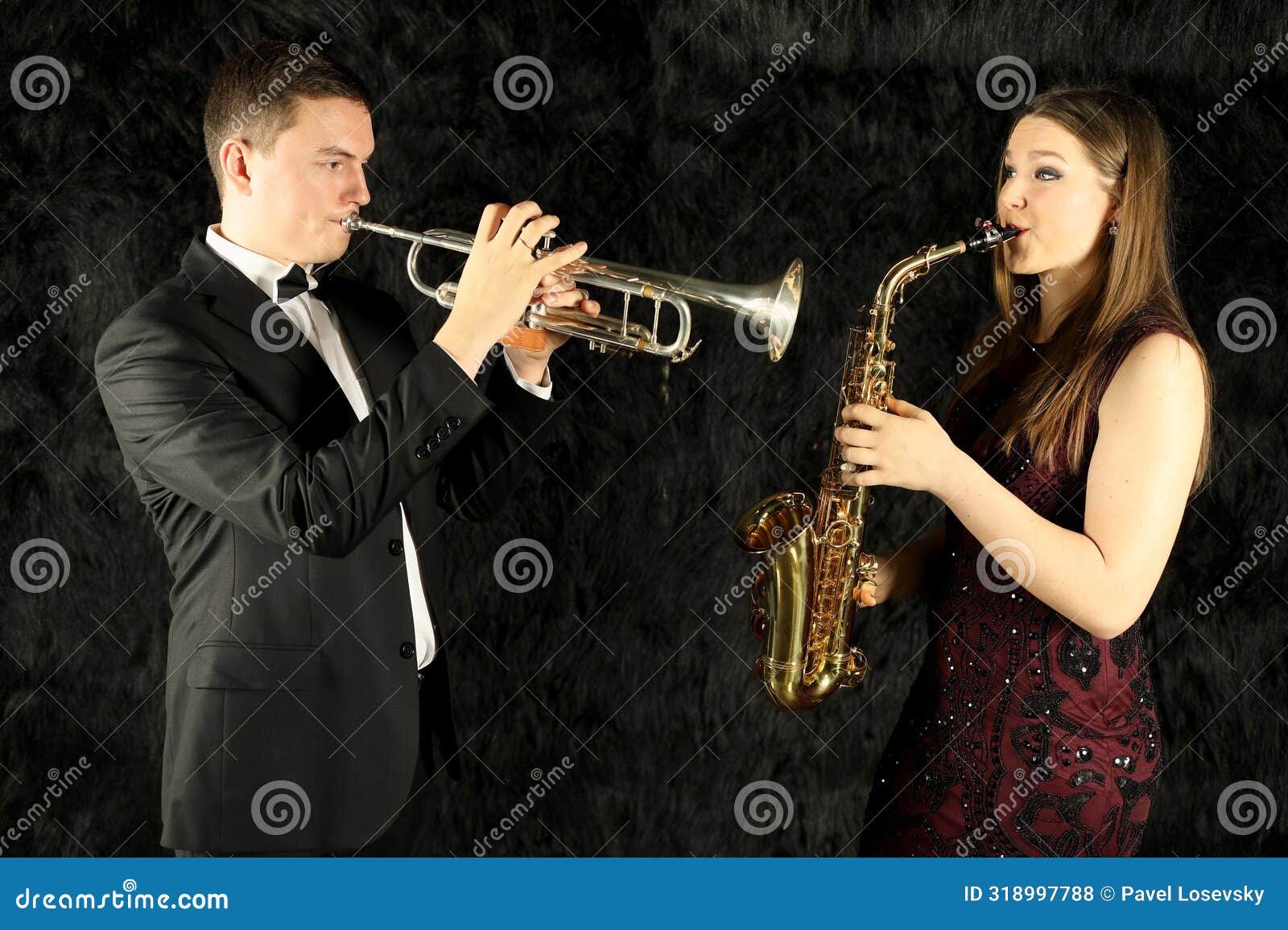 Two Musicians Playing on Wind Instruments on a Stock Photo - Image of ...