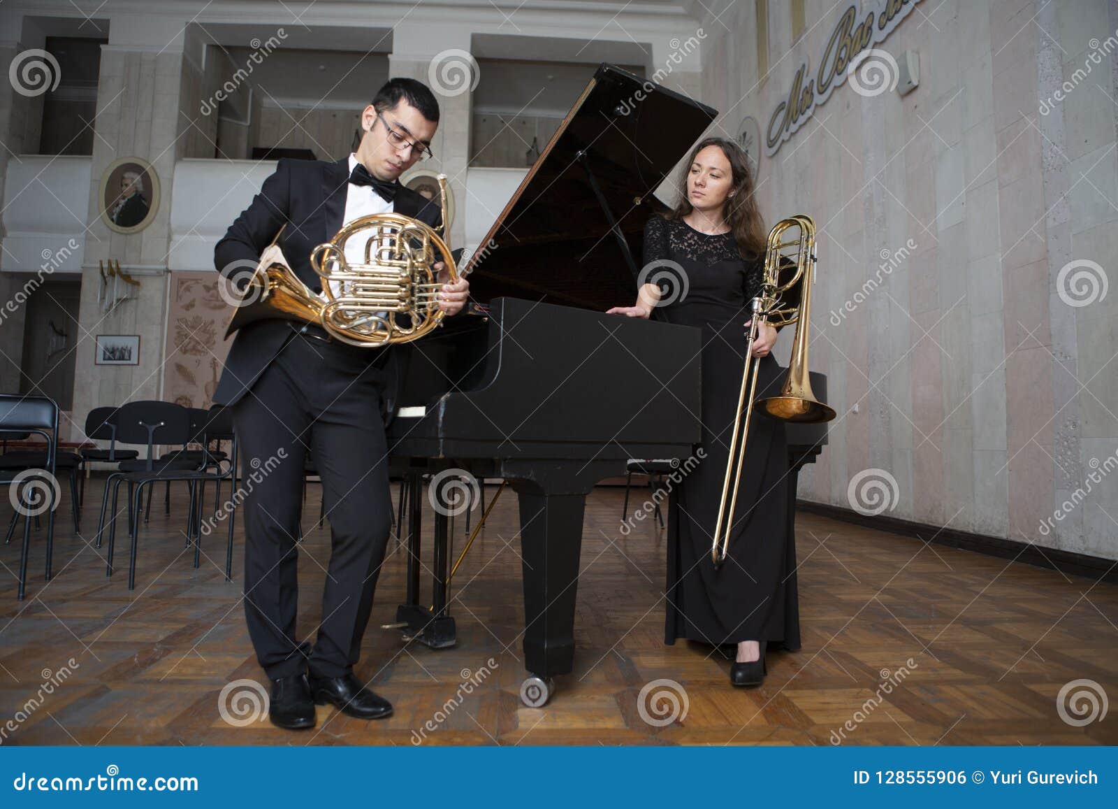 Two Musicians Playing on Wind Instruments Stock Photo - Image of ...