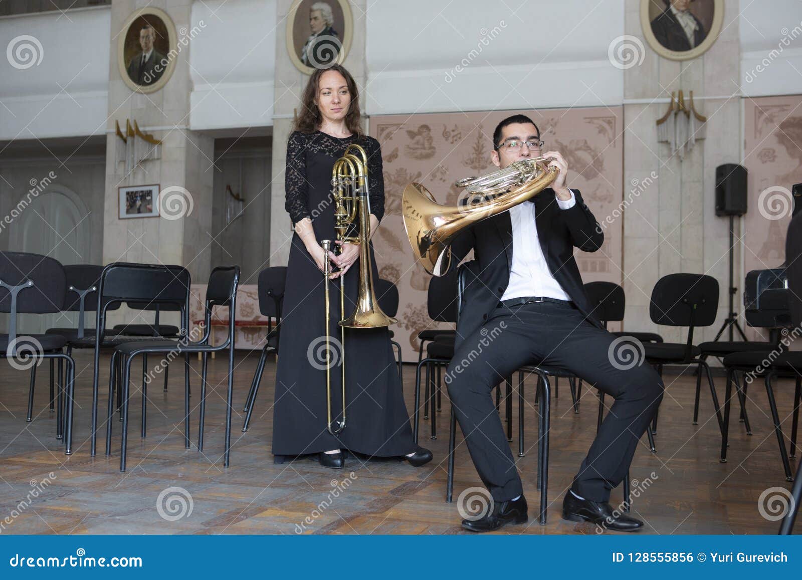 Two Musicians Playing on Wind Instruments Stock Photo - Image of horn ...