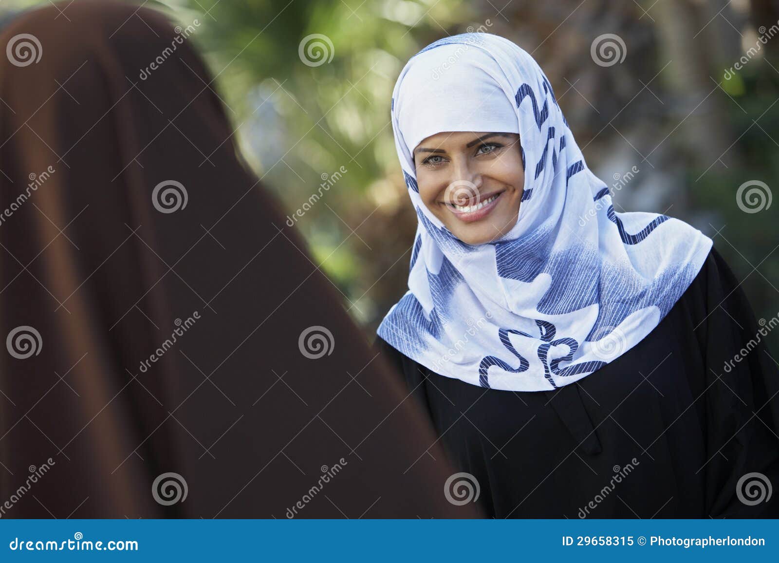 Two Muslim Female Friends stock image. Image of religion - 29658315