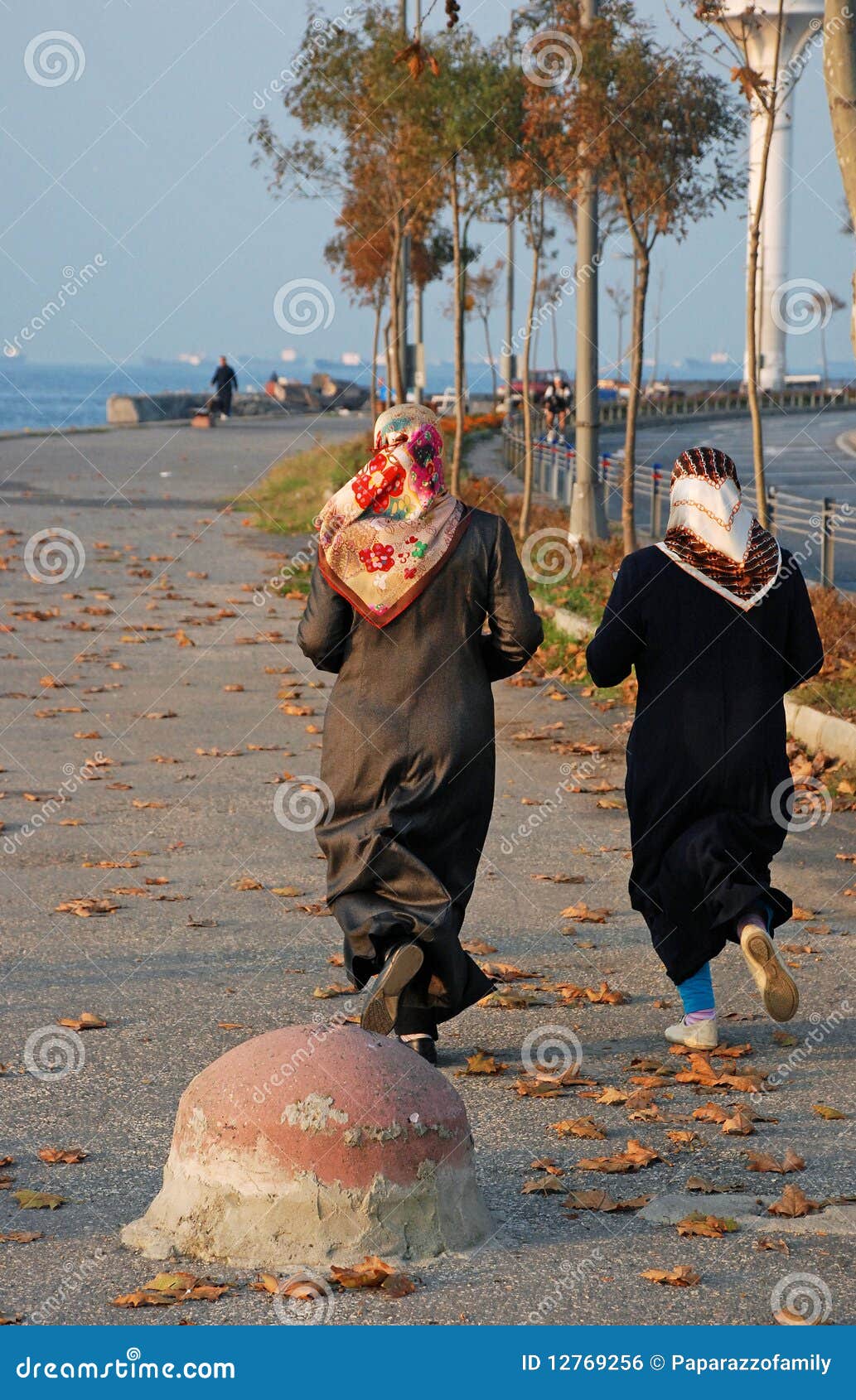Two Muslim women jogging stock photo. Image of daylight - 12769256