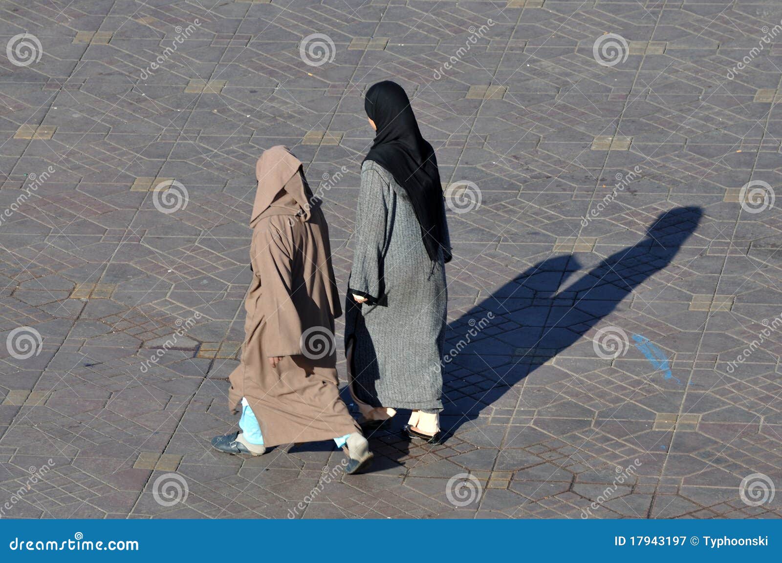 Two muslim women walking editorial photography. Image of moroccan ...