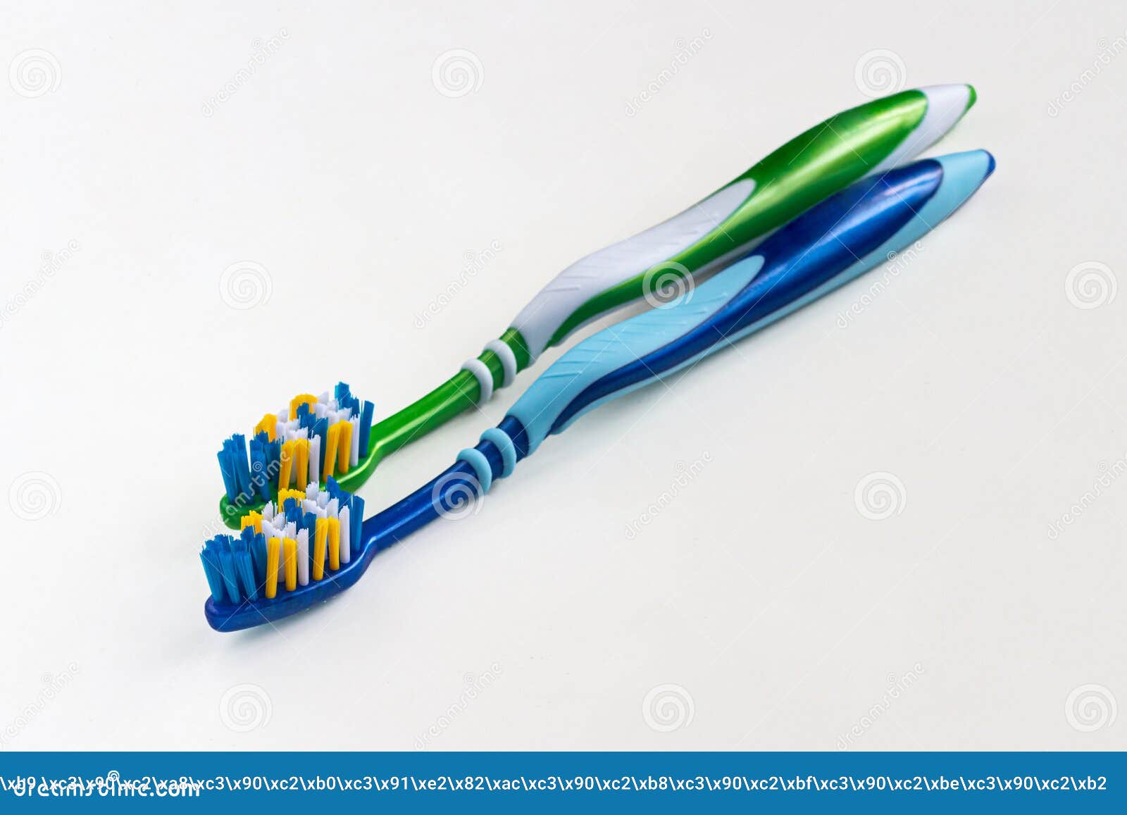 Two New Toothbrushes, Green and Blue on a Light Background Stock Image ...