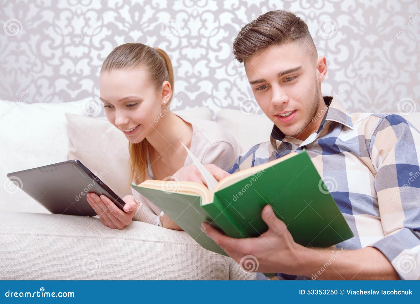 Two Nice Young People Reading Stock Photo - Image of couple, lady: 53353250