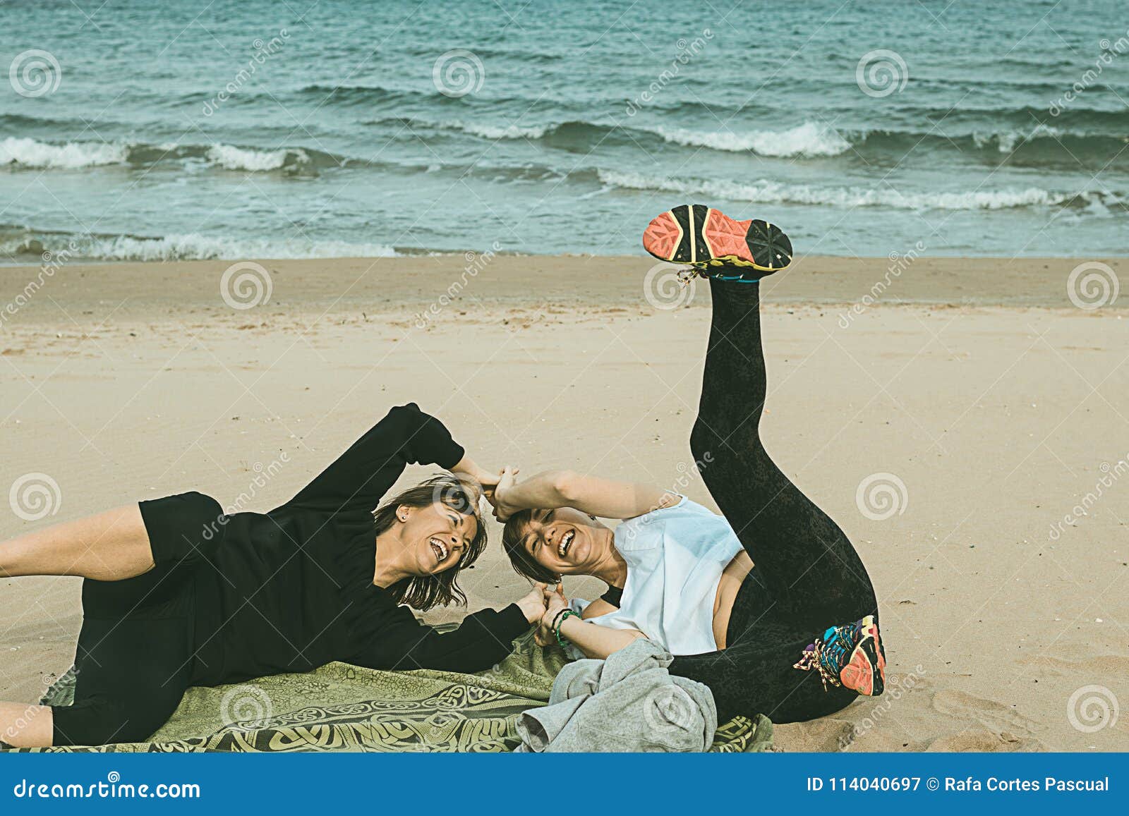Two Women Having Fun on the Beach Stock Image - Image of cheerful ...