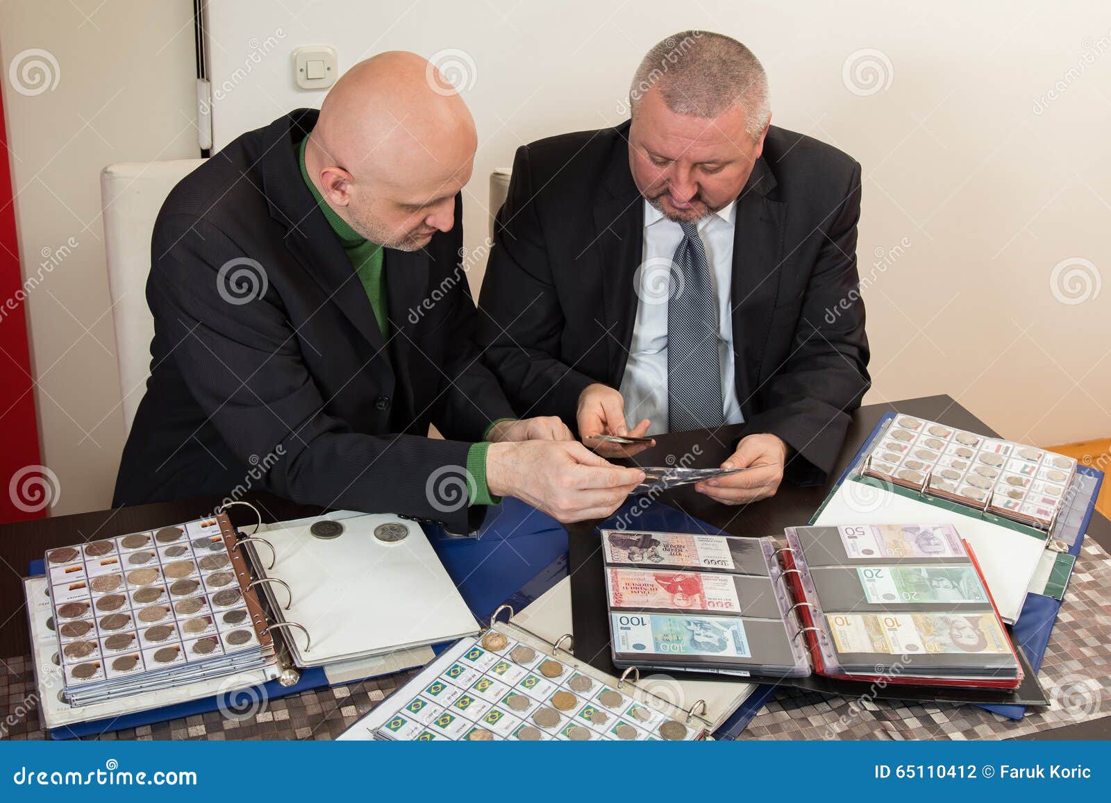Two Numismatists Examines Collection of Coin Stock Photo - Image of ...