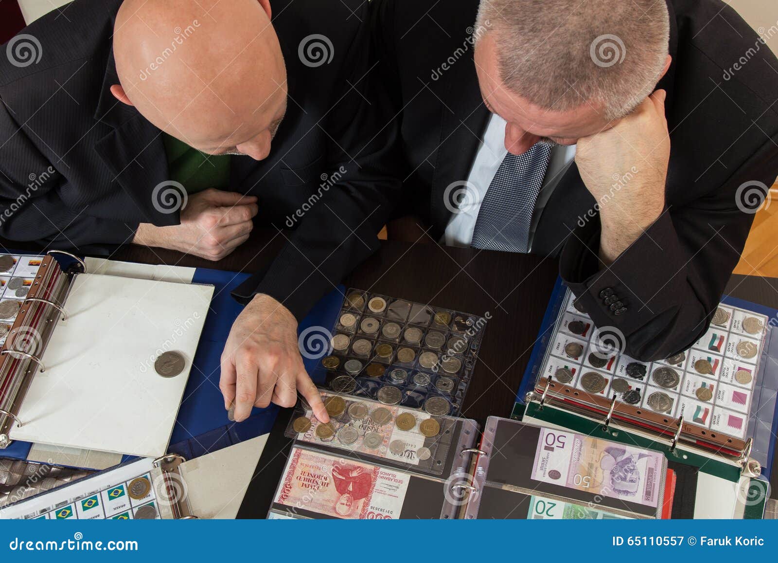 Two Numismatists Examines Collection of Coin Stock Image - Image of ...
