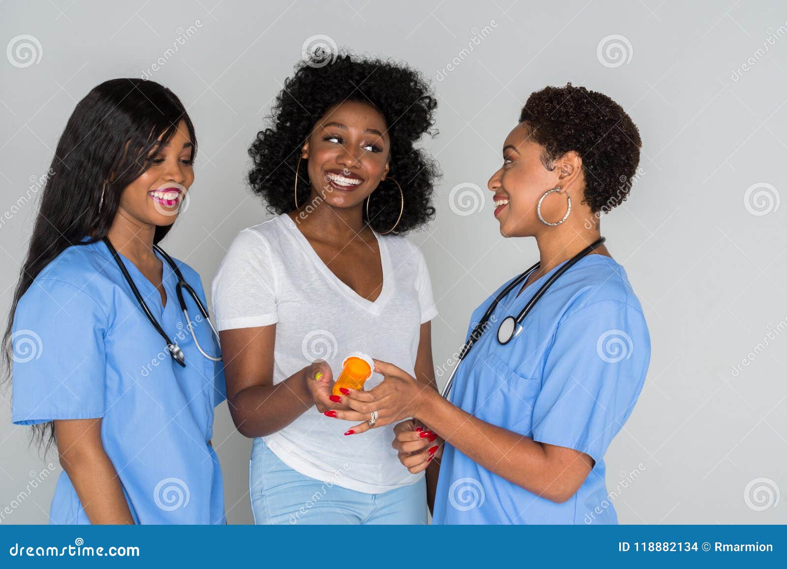Two Nurses with Patient stock photo. Image of occupation - 118882134