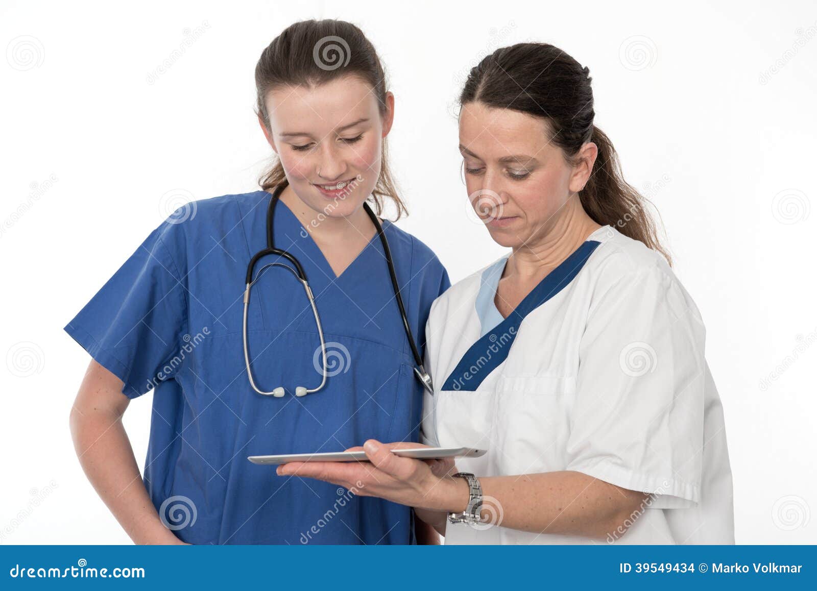 Two Nurses Using a Tablet PC Stock Photo - Image of intensive, clinic ...