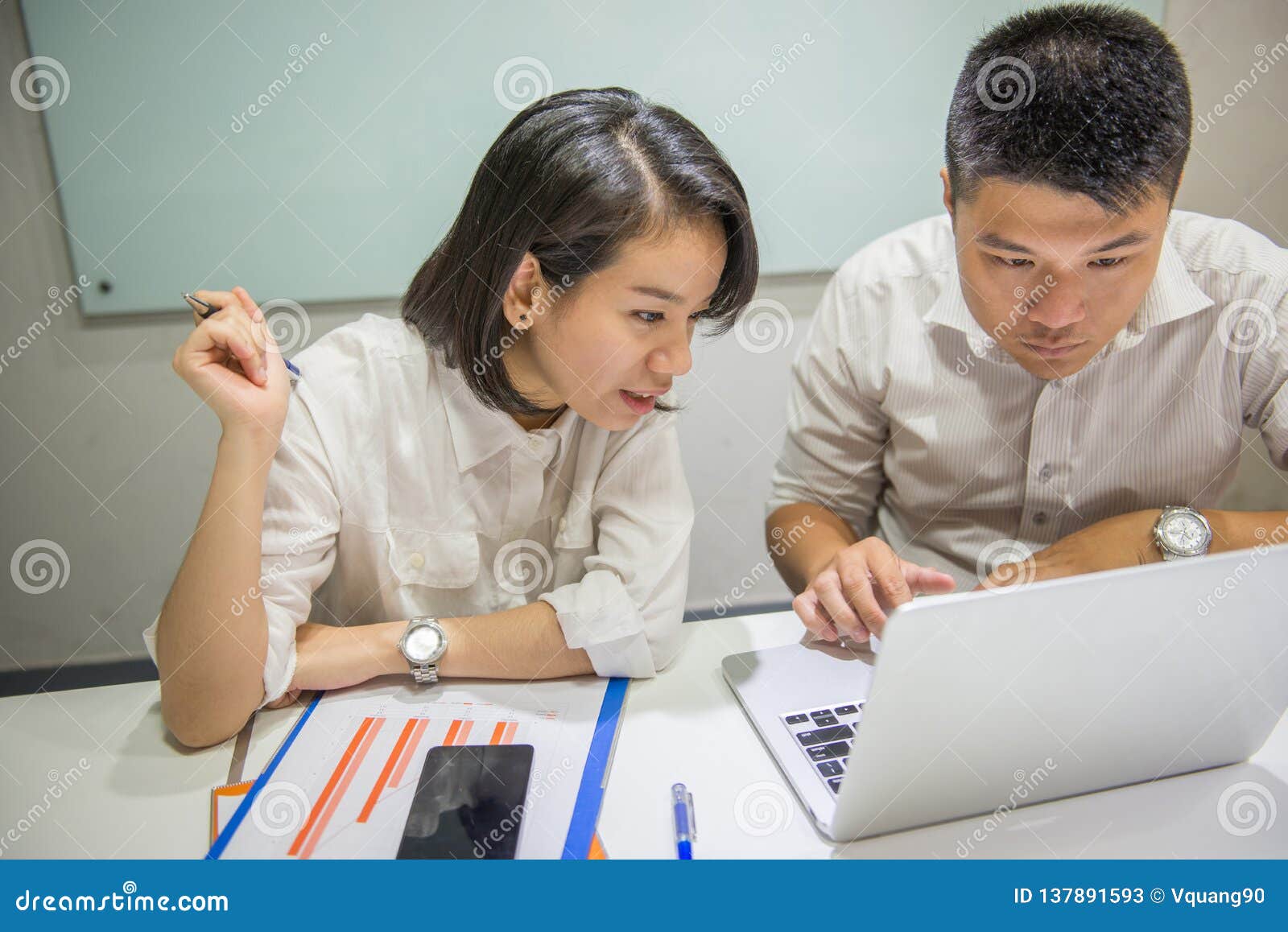 Two Office Employees Working in a Team Stock Image - Image of ...