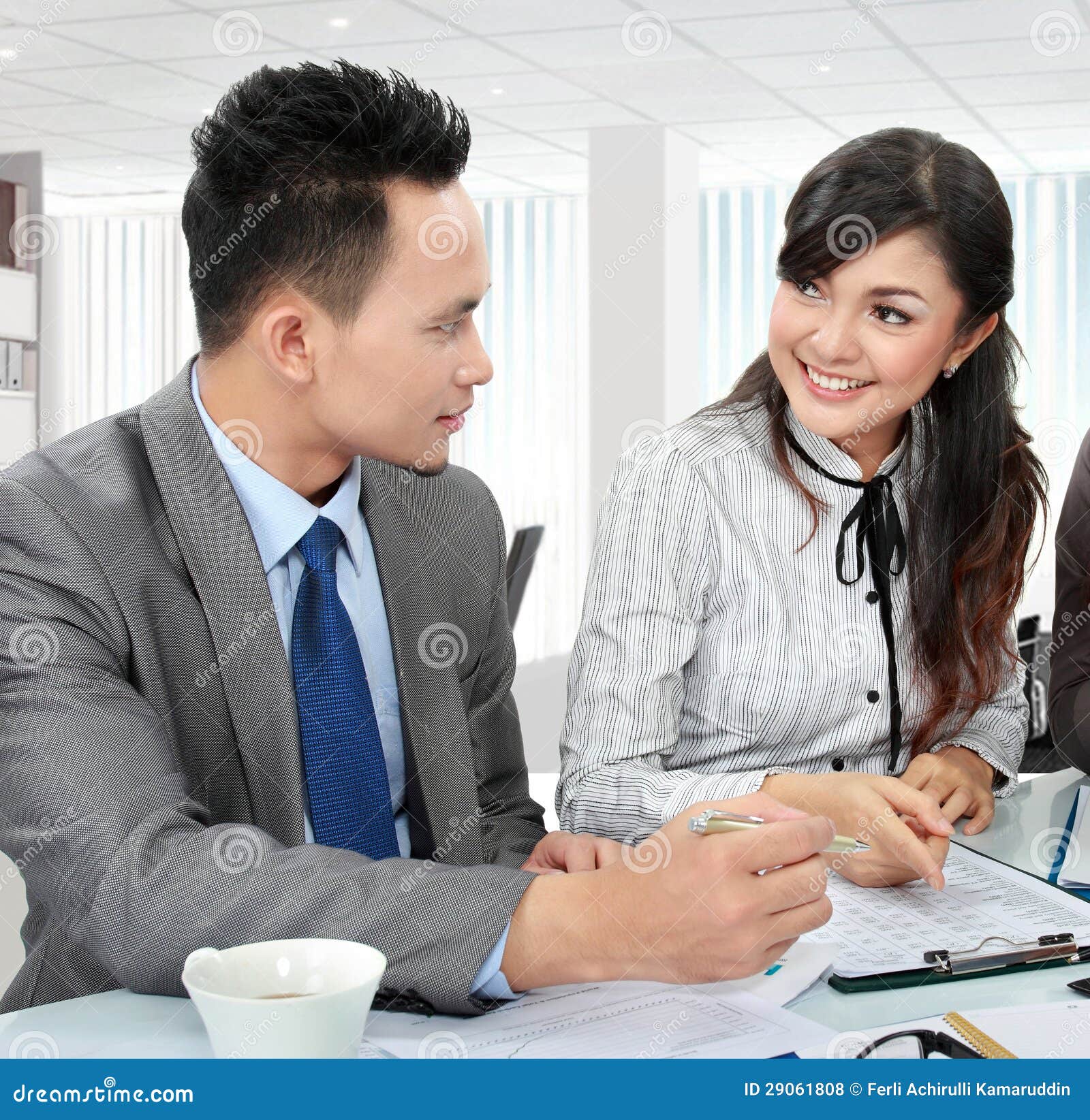 Two office worker discuss stock photo. Image of discussing - 29061808