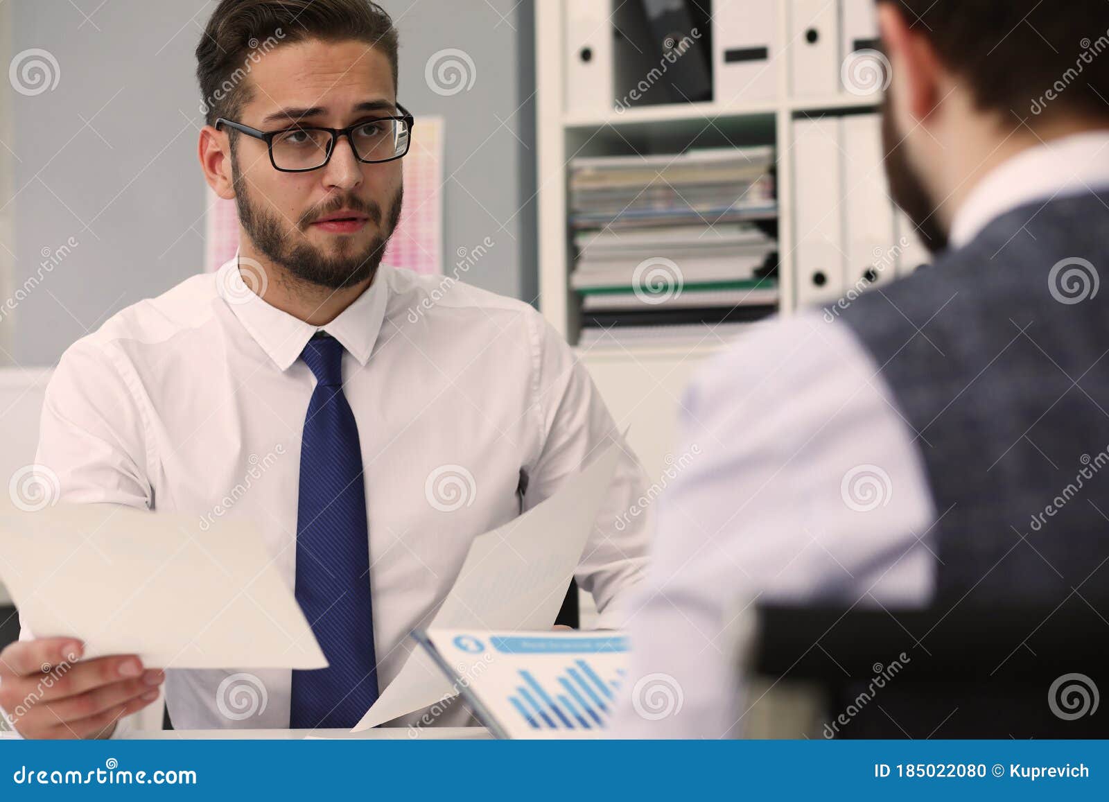 Handsome Young Manager Talking To His Colleague Stock Photo - Image of ...