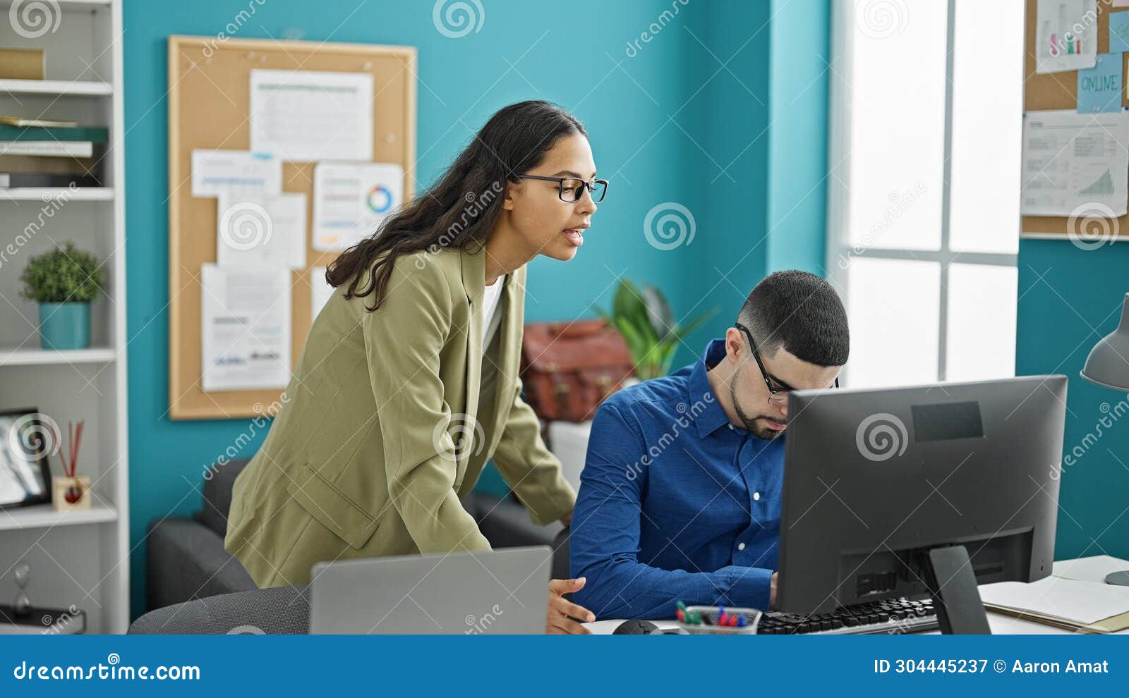 Two Office Workers, a Man and Woman, Sitting at a Table, Entangled in a ...