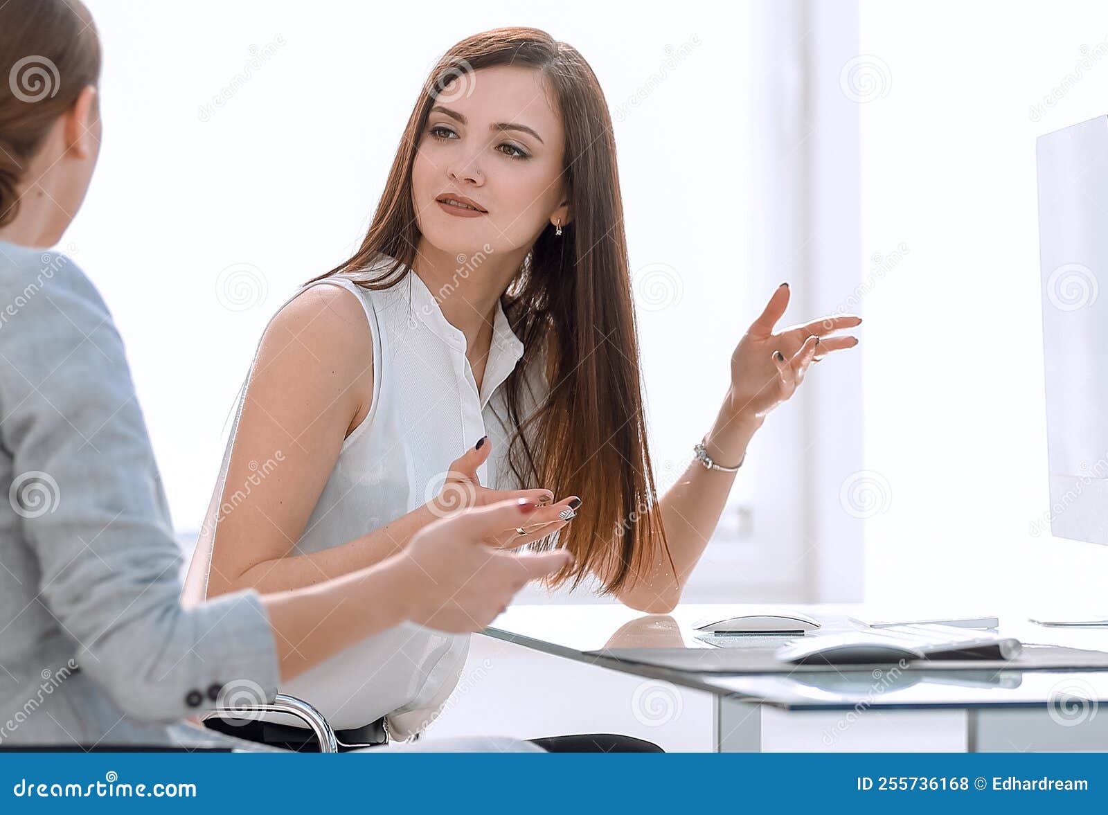 Two Office Workers Talking in the Workplace Stock Photo - Image of ...