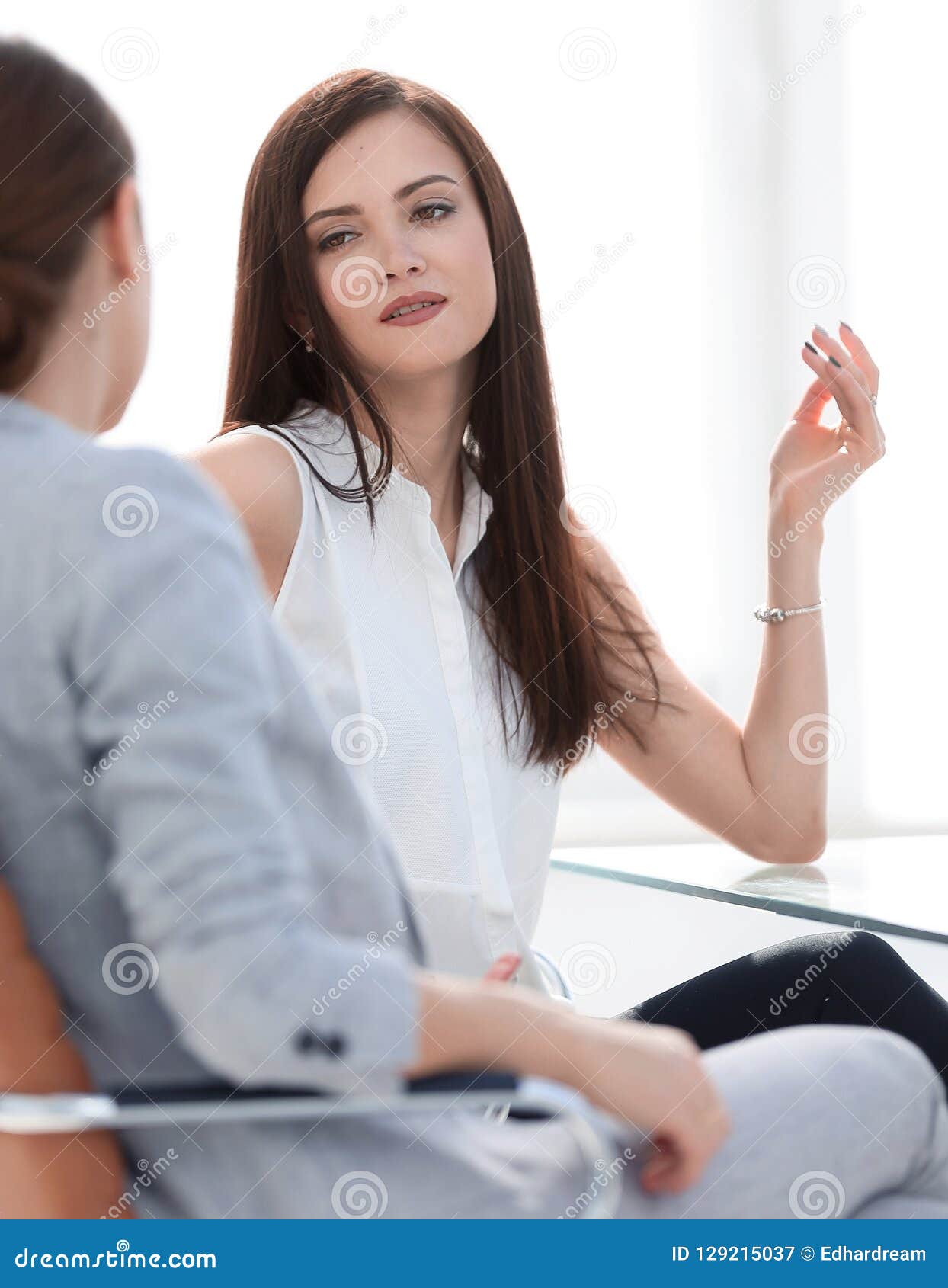 Two Office Workers Talking in the Workplace Stock Image - Image of ...