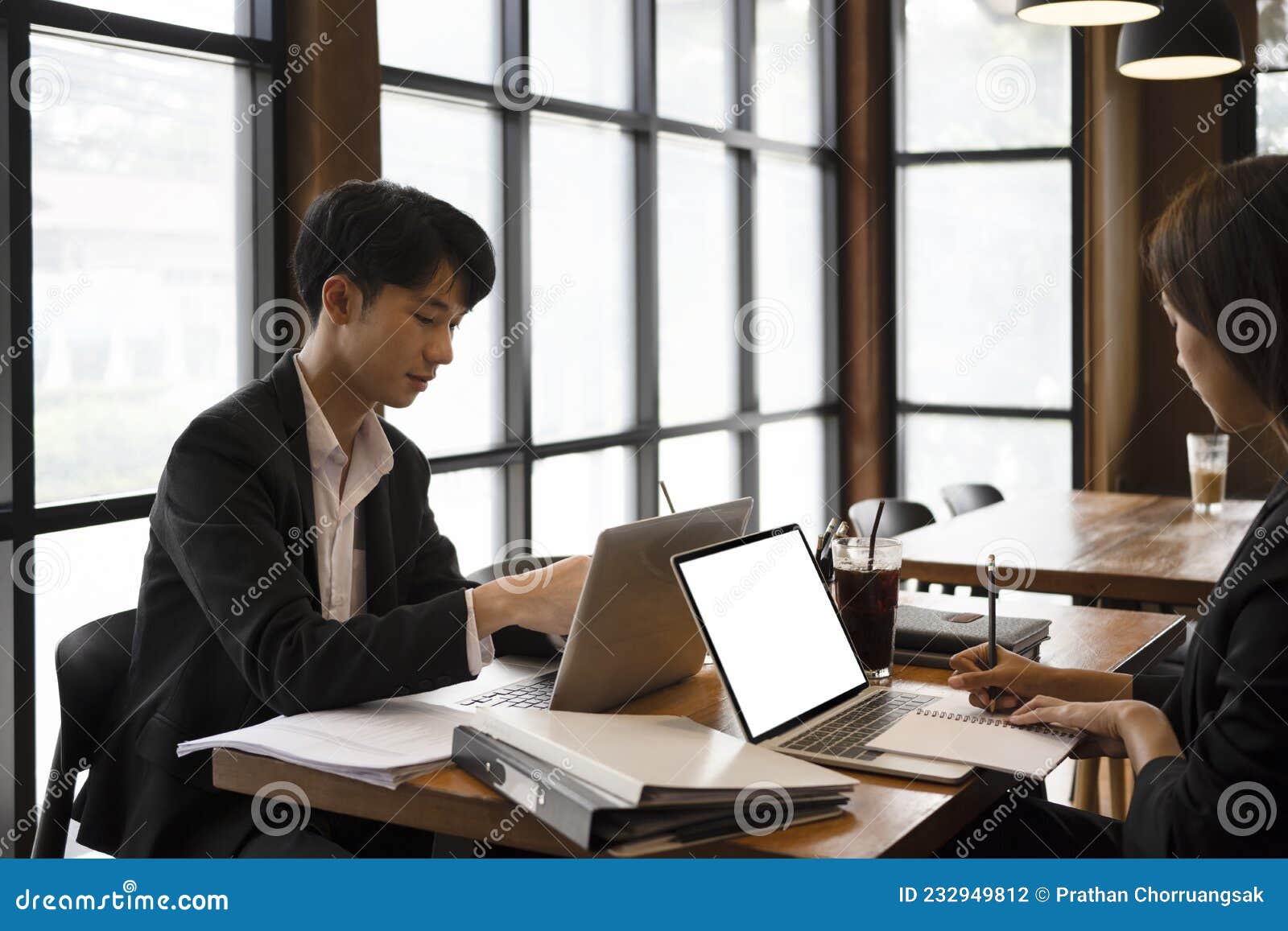 Two Office Workers Working on New Project Together in Office. Stock ...