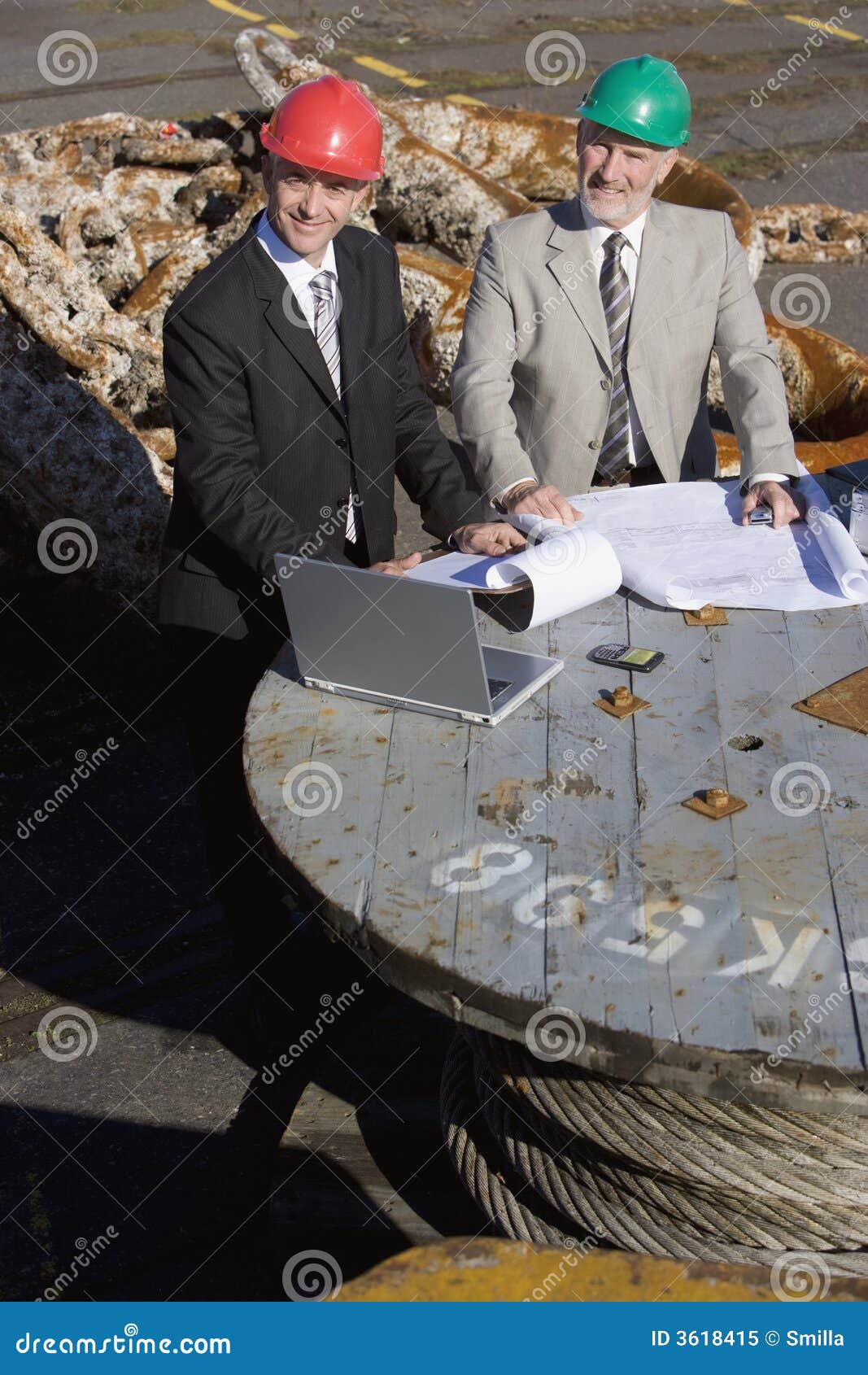 Two Oil Platform Inspectors with a Laptop Stock Image - Image of ...