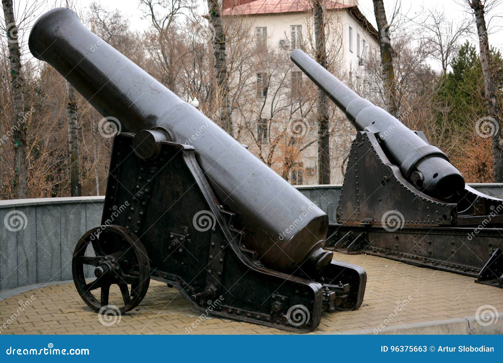 Two old artillery cannons stock image. Image of ages - 96375663
