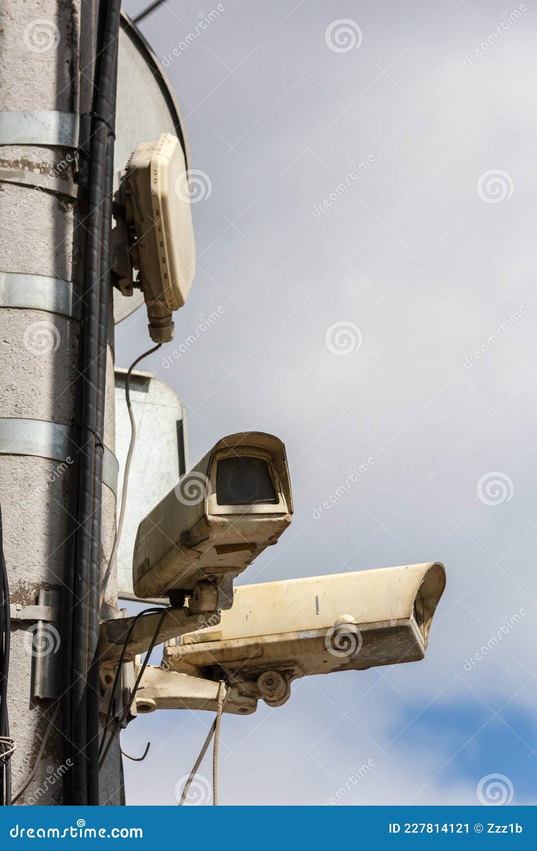 Two Old Cctv Security Surveillance Cameras on Street Light Pole on Blue ...