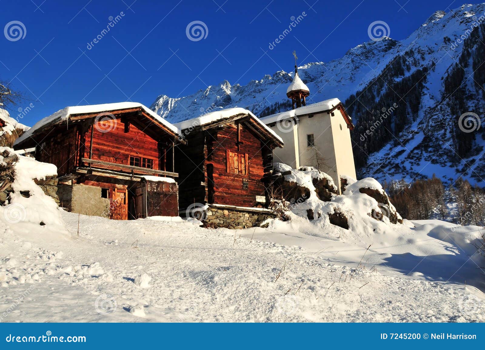 Two Old Chalets and a Chapel in the Snow Stock Photo - Image of ...