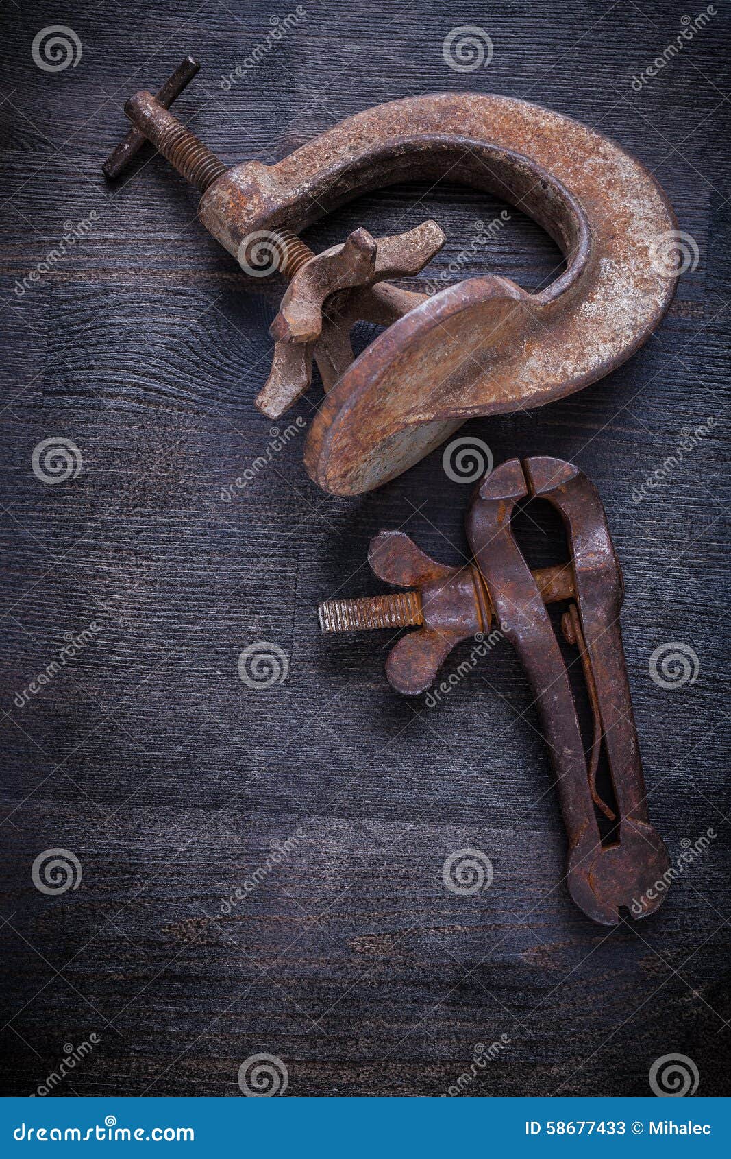 Two Old Clamps on Vintage Wood Board Stock Image - Image of rust ...
