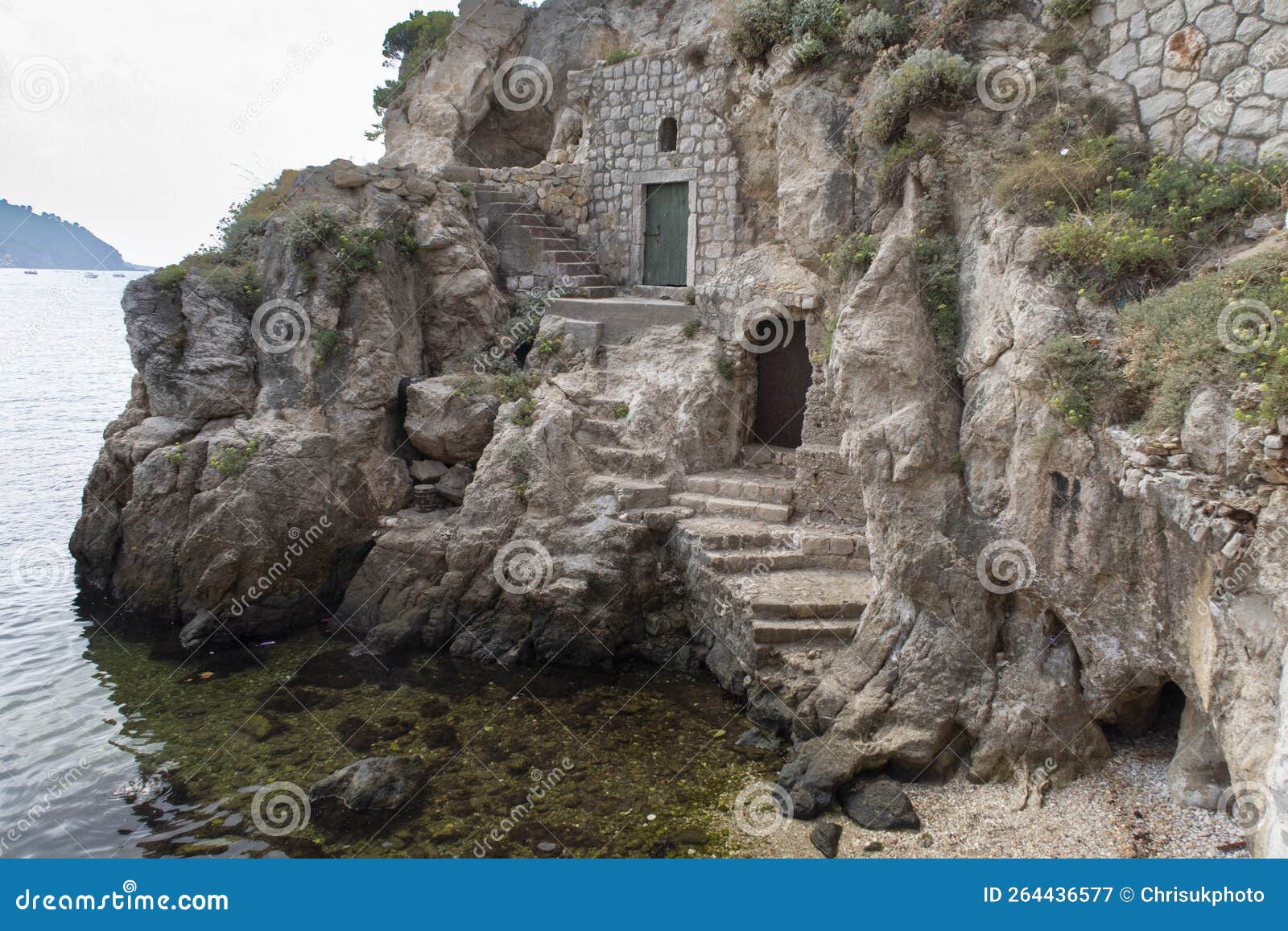 Two Old Doors in a Cliff in a Bay in Dubrovnik Stock Image - Image of ...