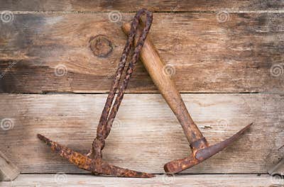 Two Old Iron Rusted Mining Picks on Wood Shelf Stock Photo - Image of ...