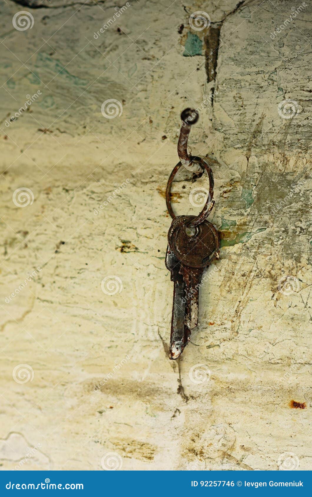 Two Old Keys are Hanging on a Hook Hammered into an the Wall Stock ...