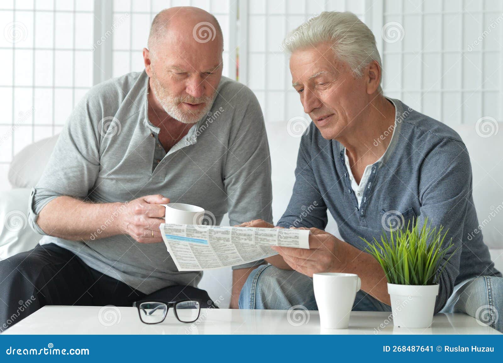 Two Old Men Sitting at Table and Discussing News Stock Image - Image of ...