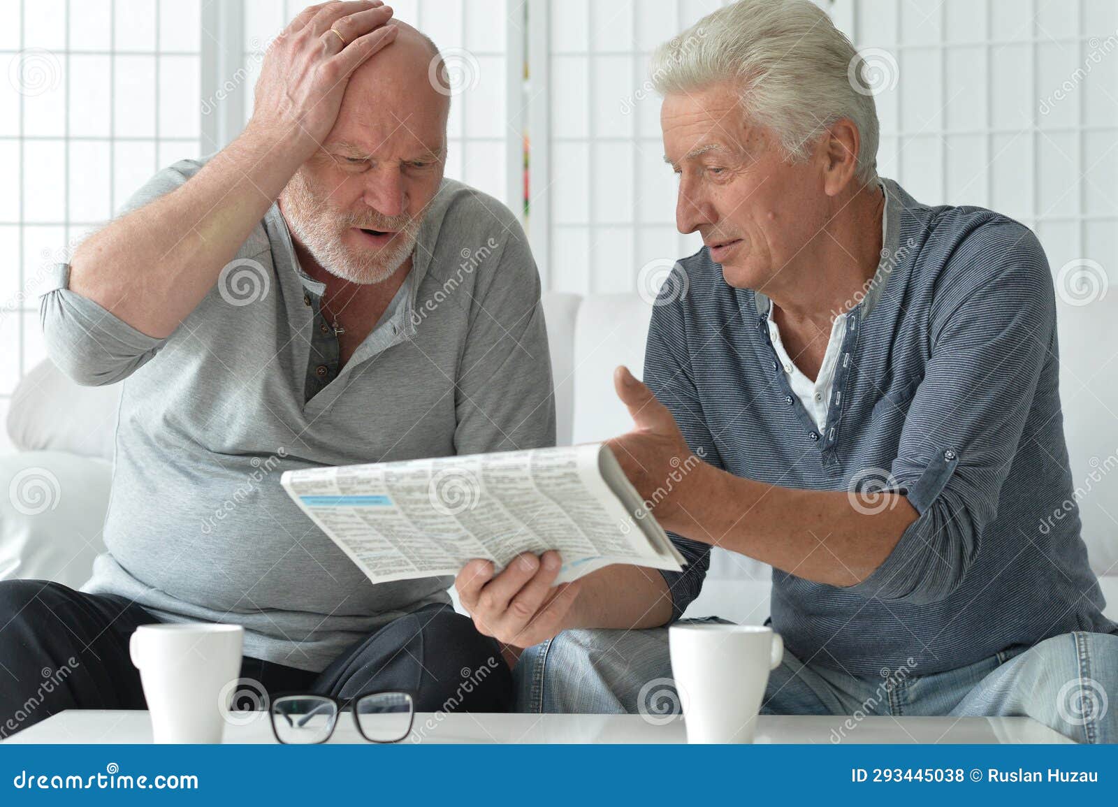 Two Old Men Sitting at Table and Discussing News Stock Photo - Image of ...