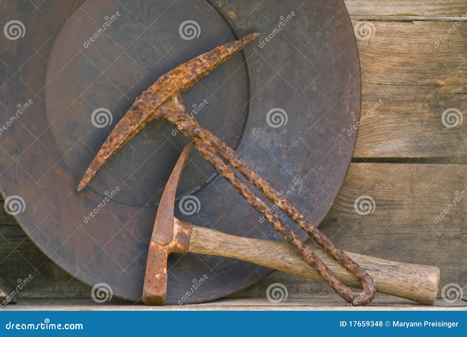 Two Old Mining Picks and Gold Pan on Shelf Stock Photo - Image of rust ...