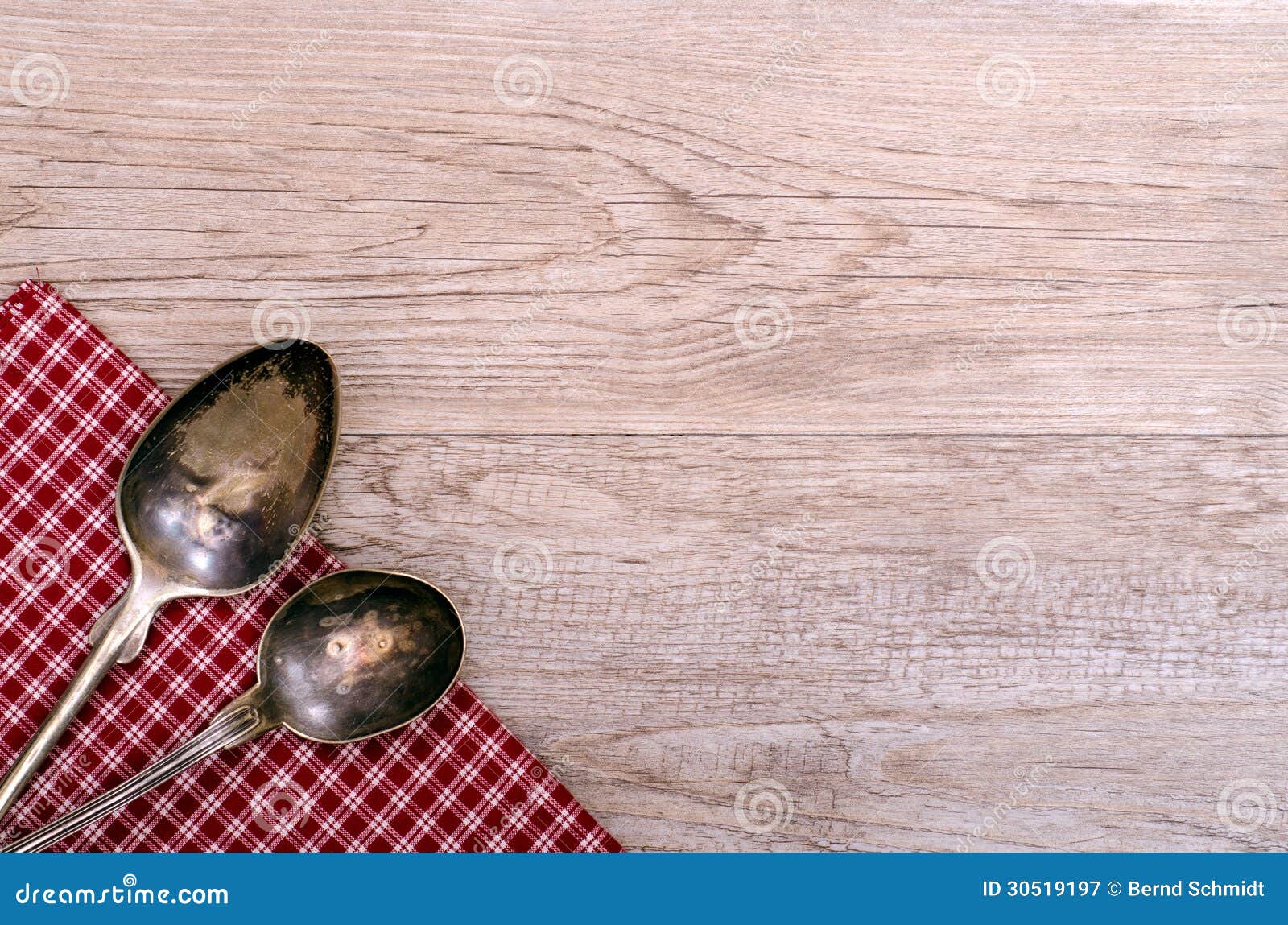 Two Old Silver Spoons on Checkered Cloth Stock Image - Image of board ...