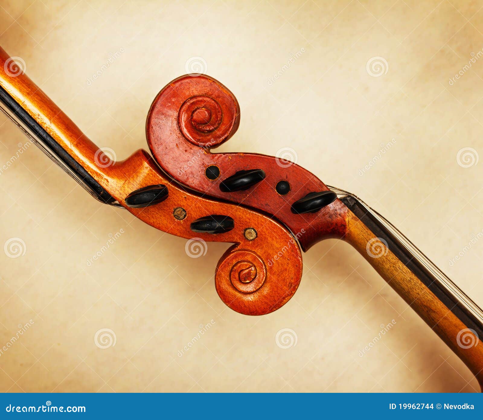 Two old violin scrolls stock photo. Image of light, music - 19962744